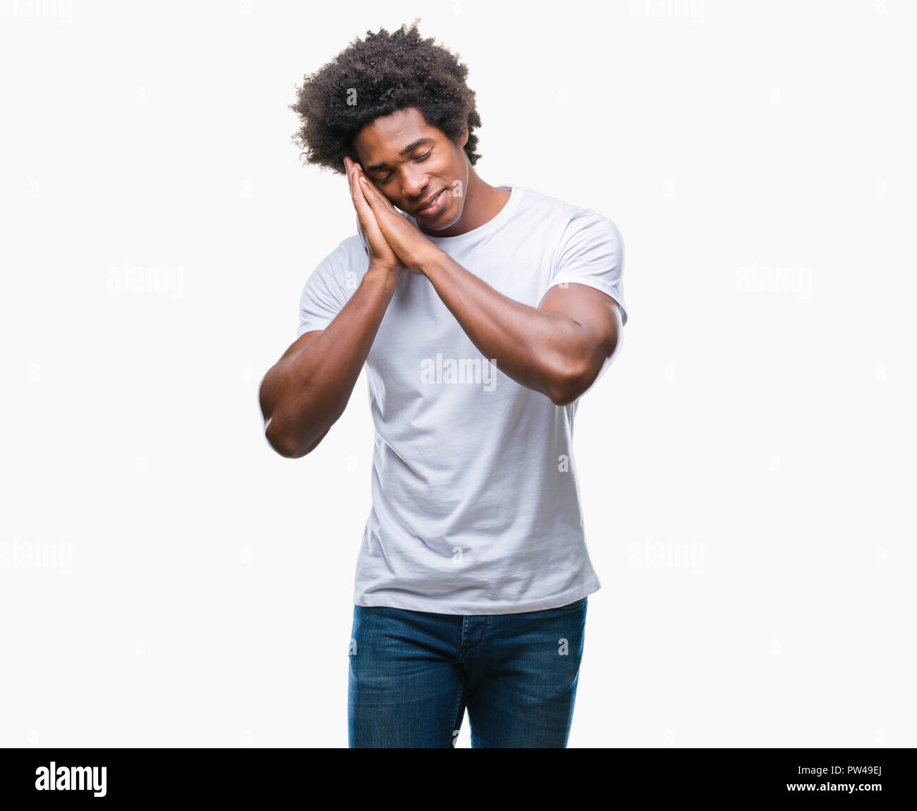 Afro american man over isolated background sleeping tired dreaming and ...