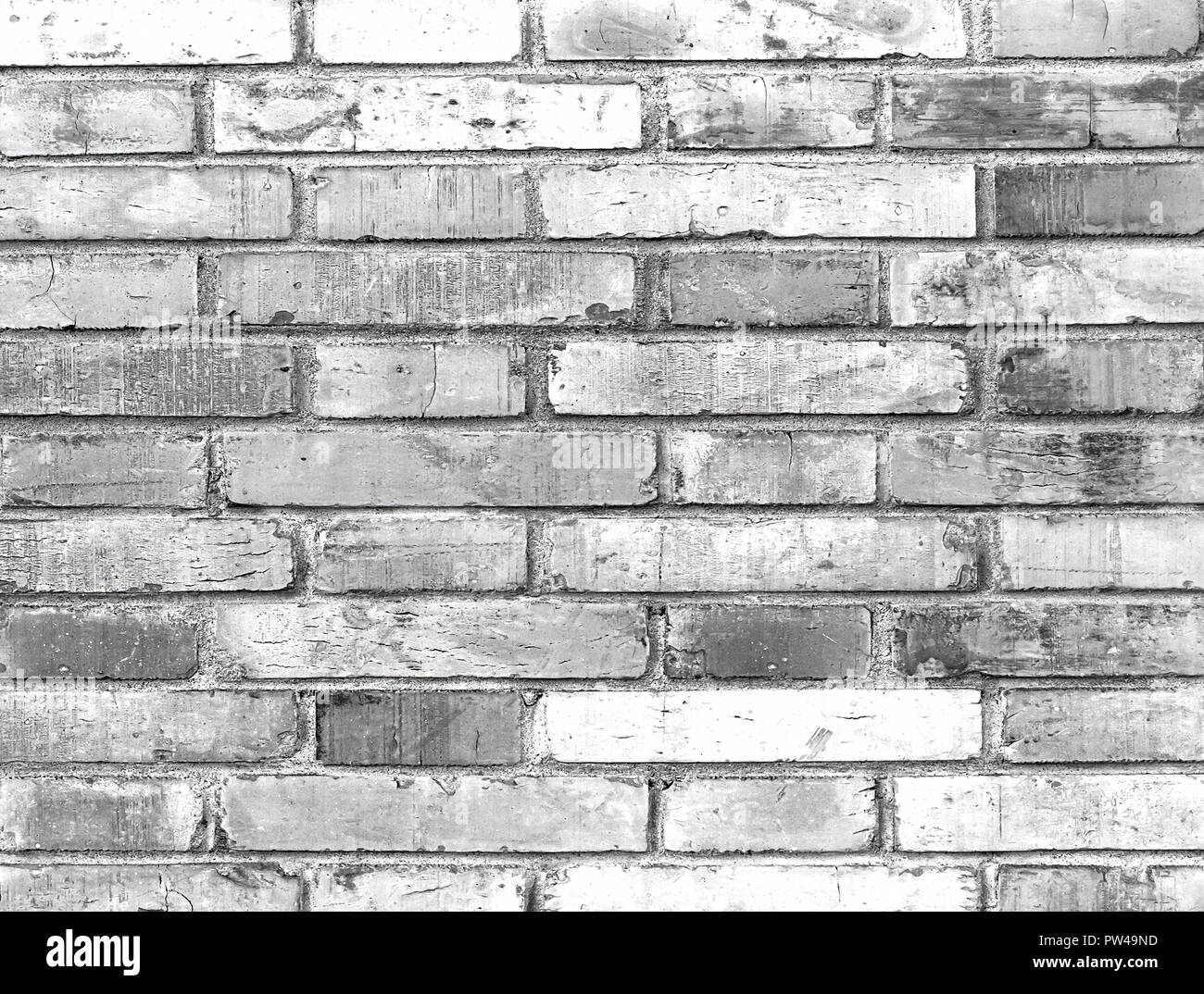 Monochrome abstract brick wall. Distressed wall with broken bricks ...