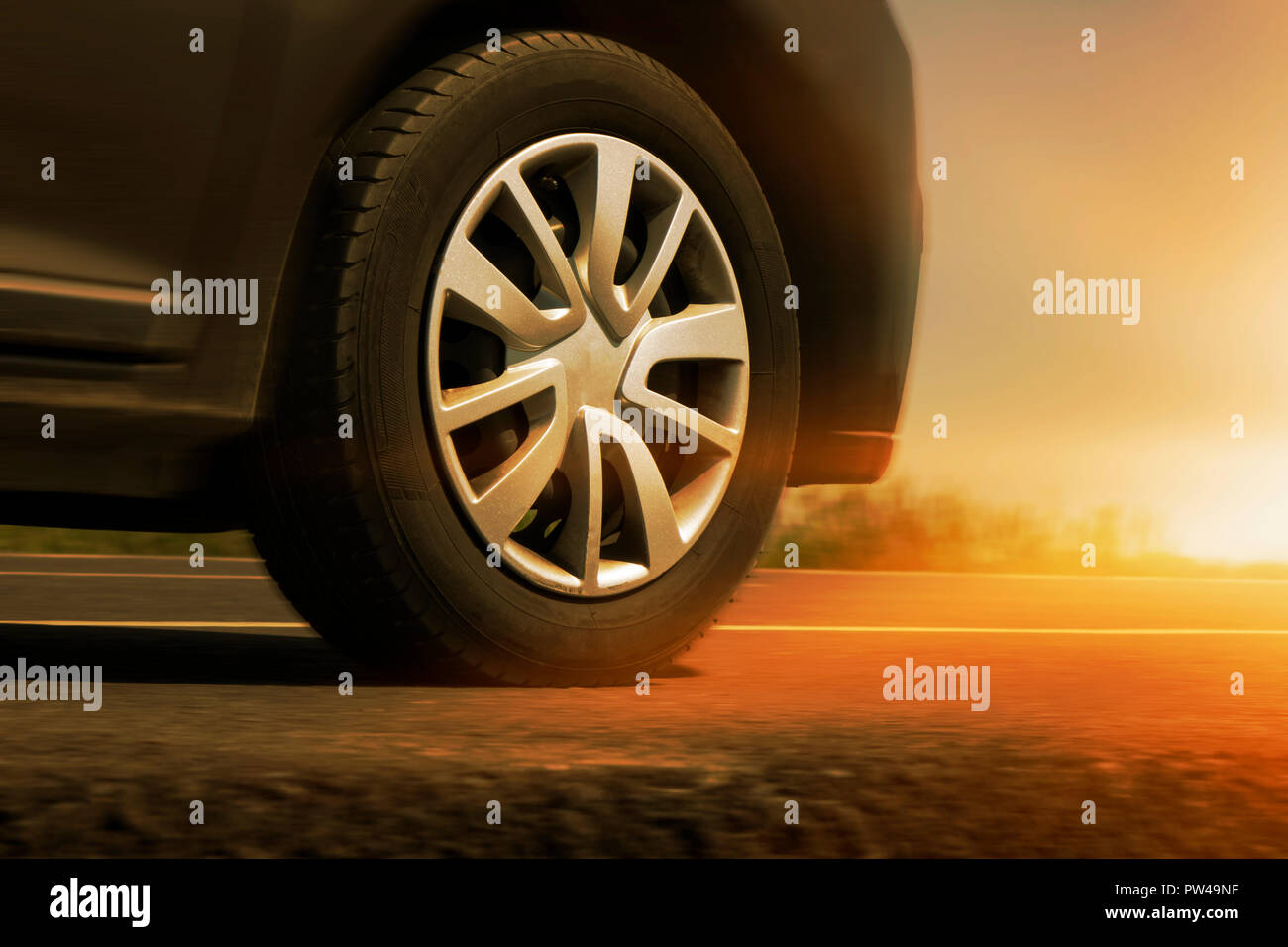 Sunny day in a city, headlights of approaching cars, the view from the ...