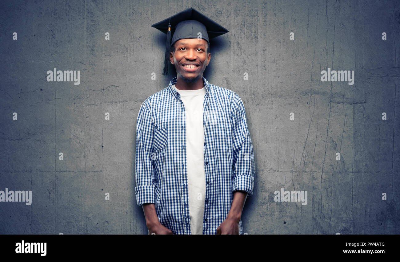 Young african graduate student black man thinking and looking up ...