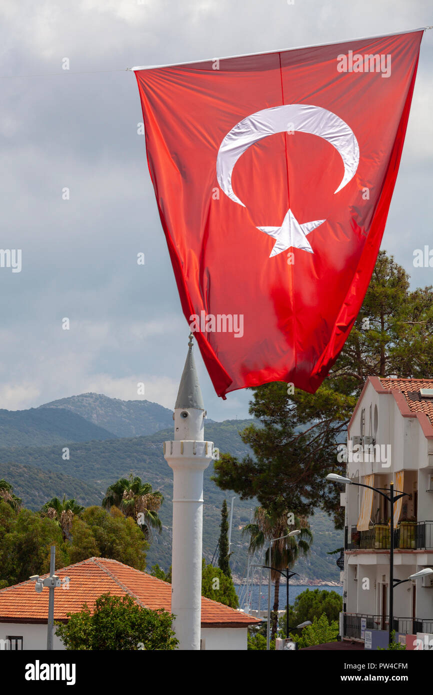Turkish flag flying over street scene in Kas, Turkey Stock Photo - Alamy