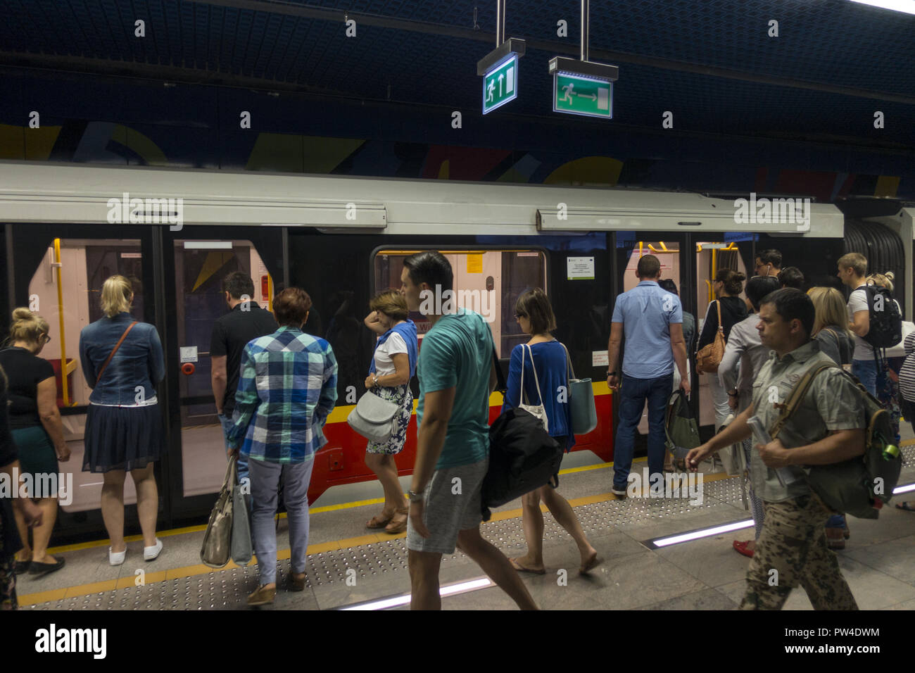 Morning rush hour on an underground metro train in central Warsaw ...
