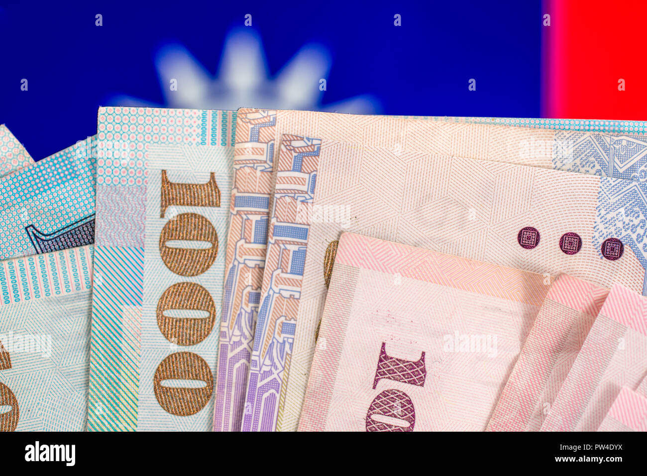 Taiwan currency notes , Taiwan currency on Taiwan flag Stock Photo - Alamy