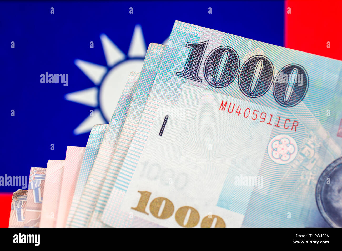Taiwan currency notes , Taiwan currency on Taiwan flag Stock Photo - Alamy
