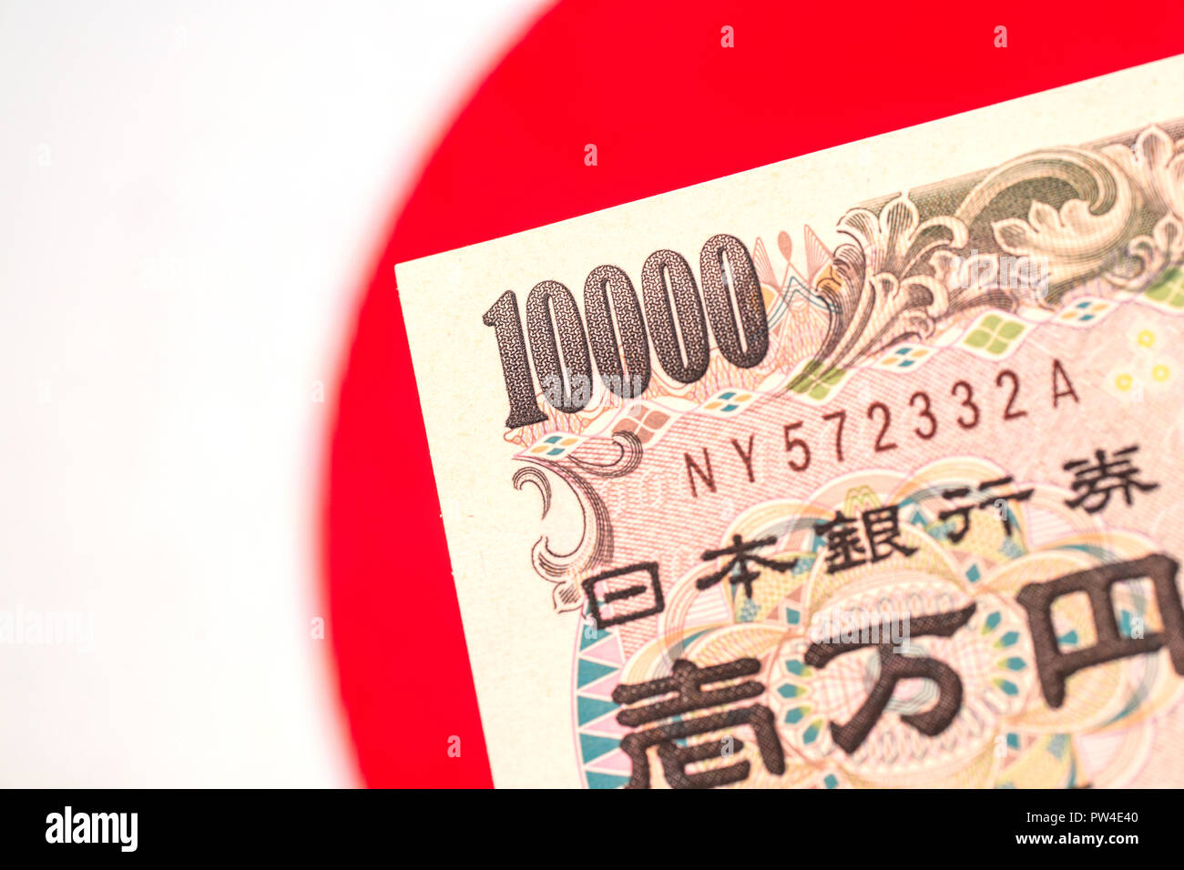 Japanese currency notes , Japanese Yen on japanese flag Stock Photo - Alamy