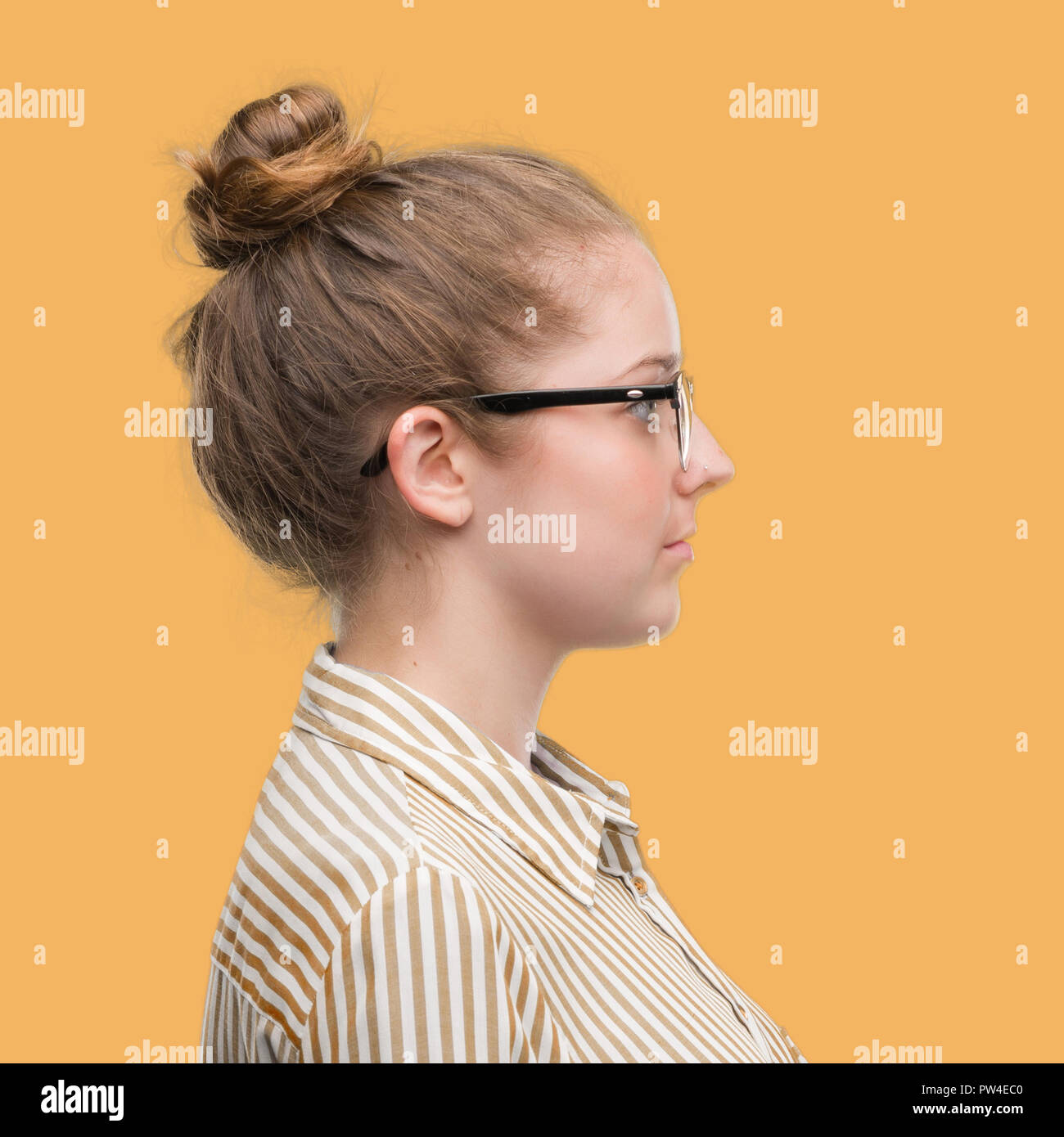 Young blonde business woman looking to side, relax profile pose with ...