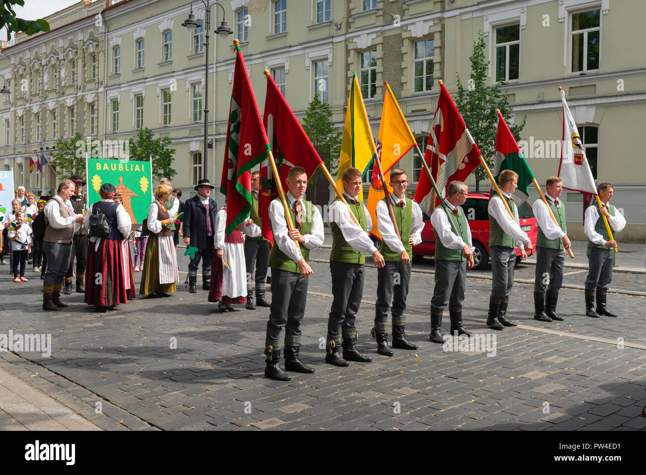 Lithuania festival, view of young people in traditional costume waiting ...