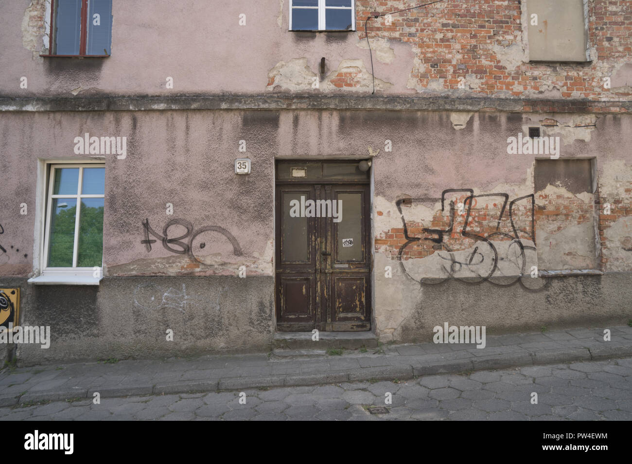 Old deteriorating building wall in Zielona Gora, Poland Stock Photo - Alamy