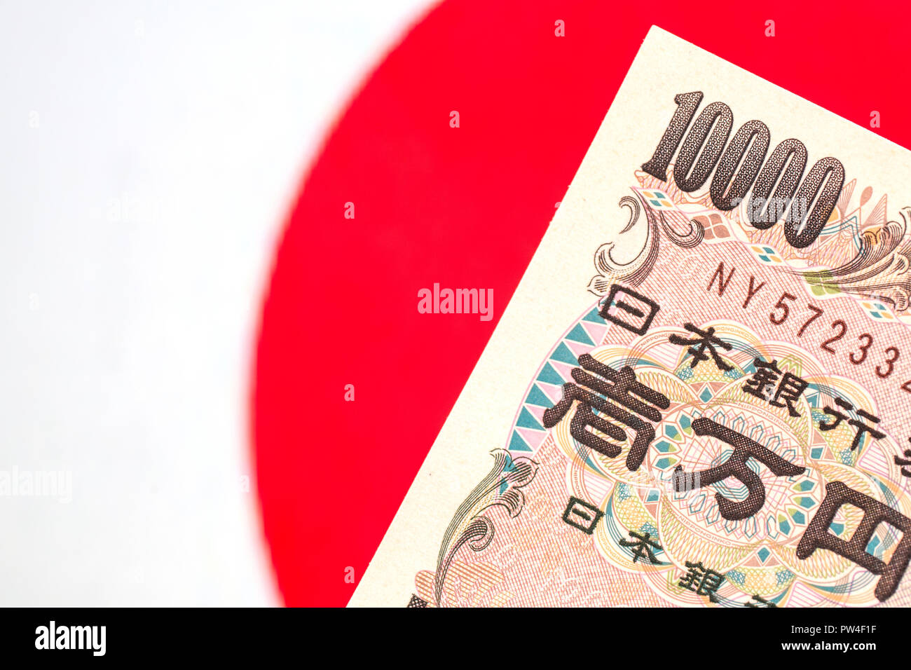 Japanese currency notes , Japanese Yen on japanese flag Stock Photo - Alamy