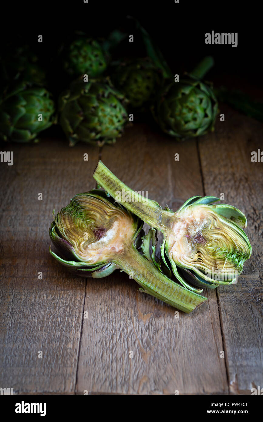 Globe artichoke cut in half showing a cross section of inside Stock ...