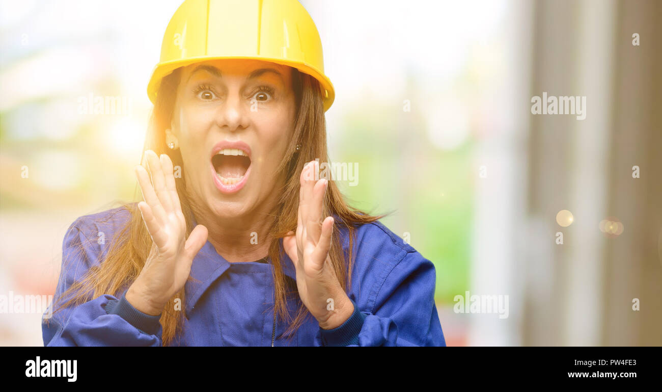 Engineer construction worker woman stressful keeping hands on head ...