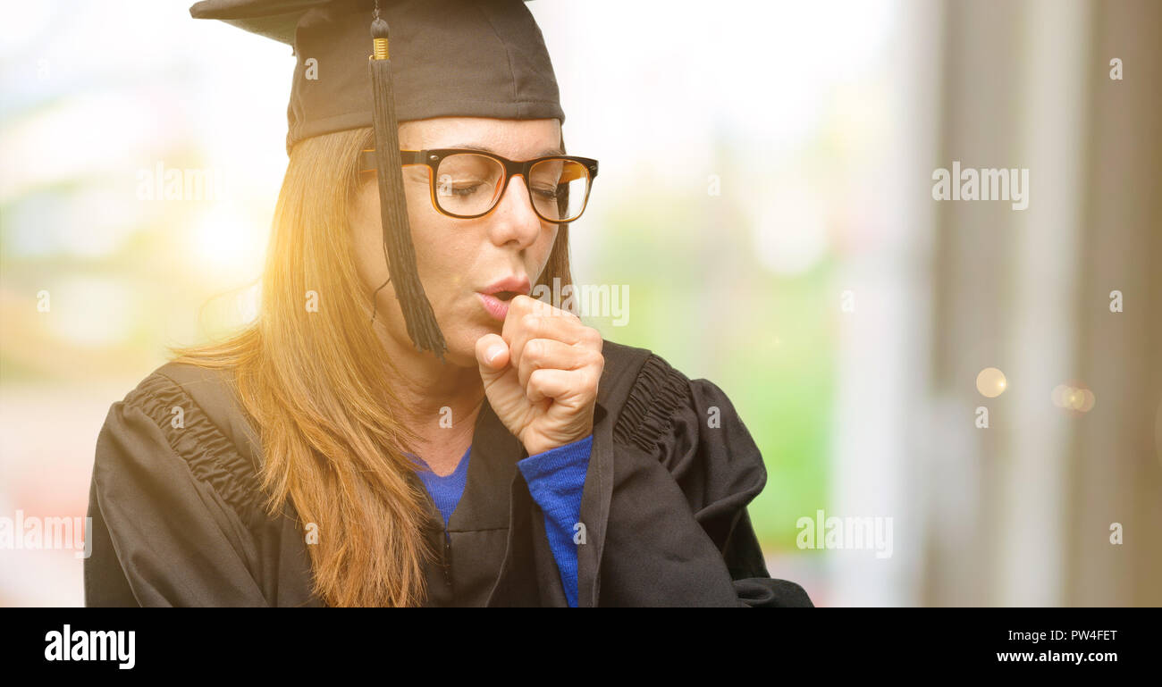 Senior graduate student woman sick and coughing, suffering asthma or ...