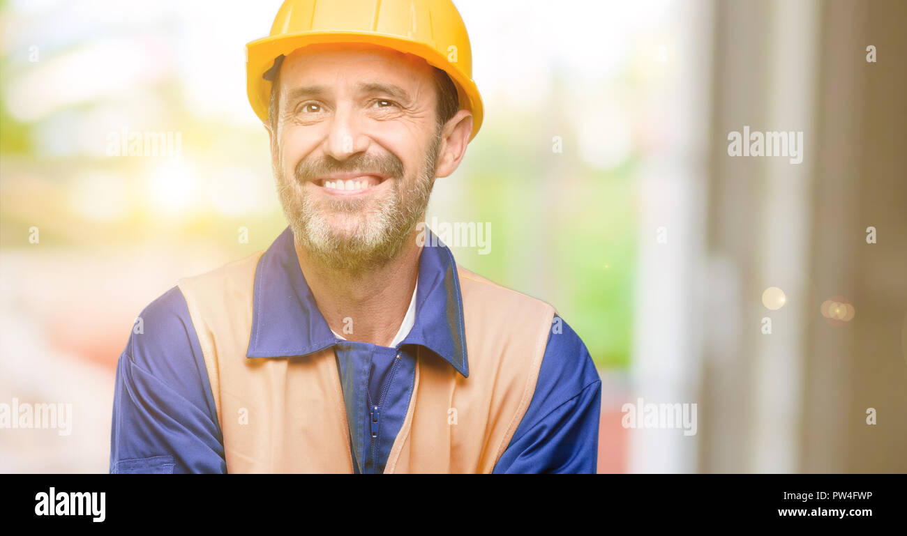Senior engineer man, construction worker thinking and looking up ...
