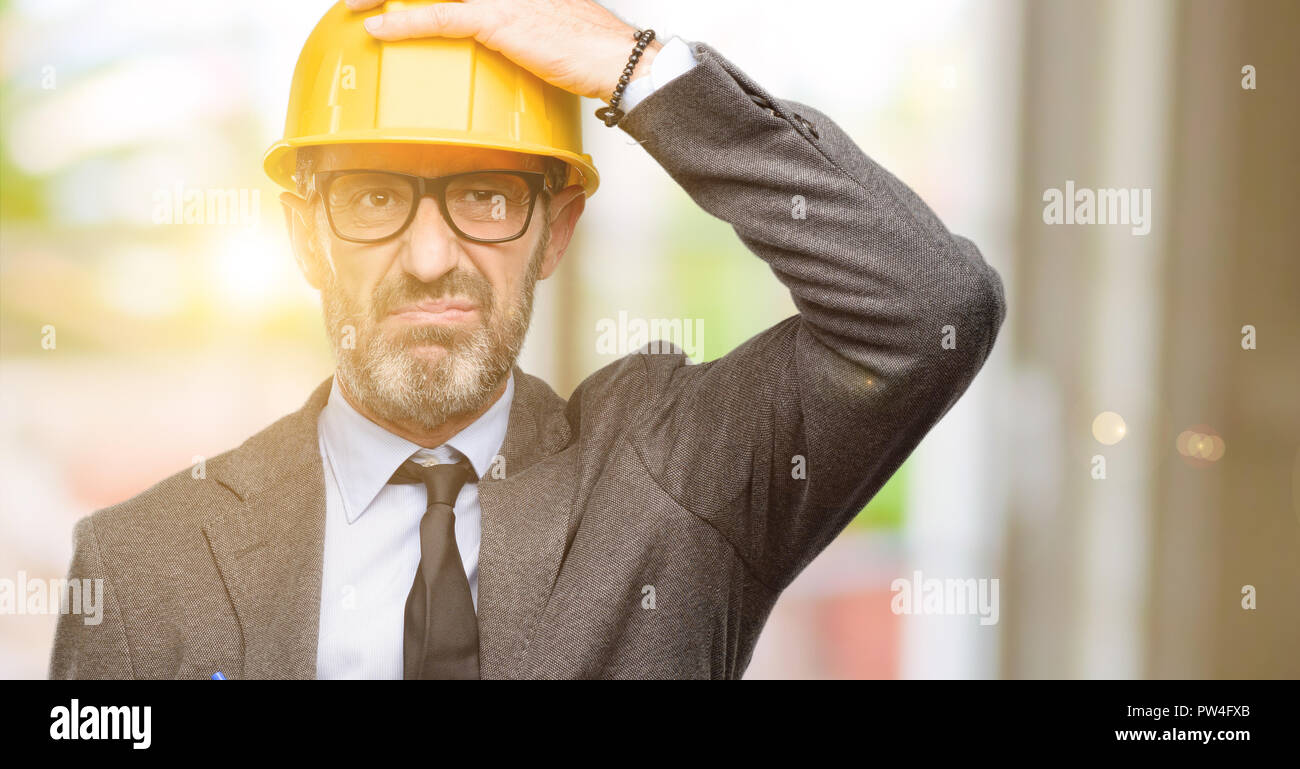 Senior architect or engineer terrified and nervous expressing anxiety ...