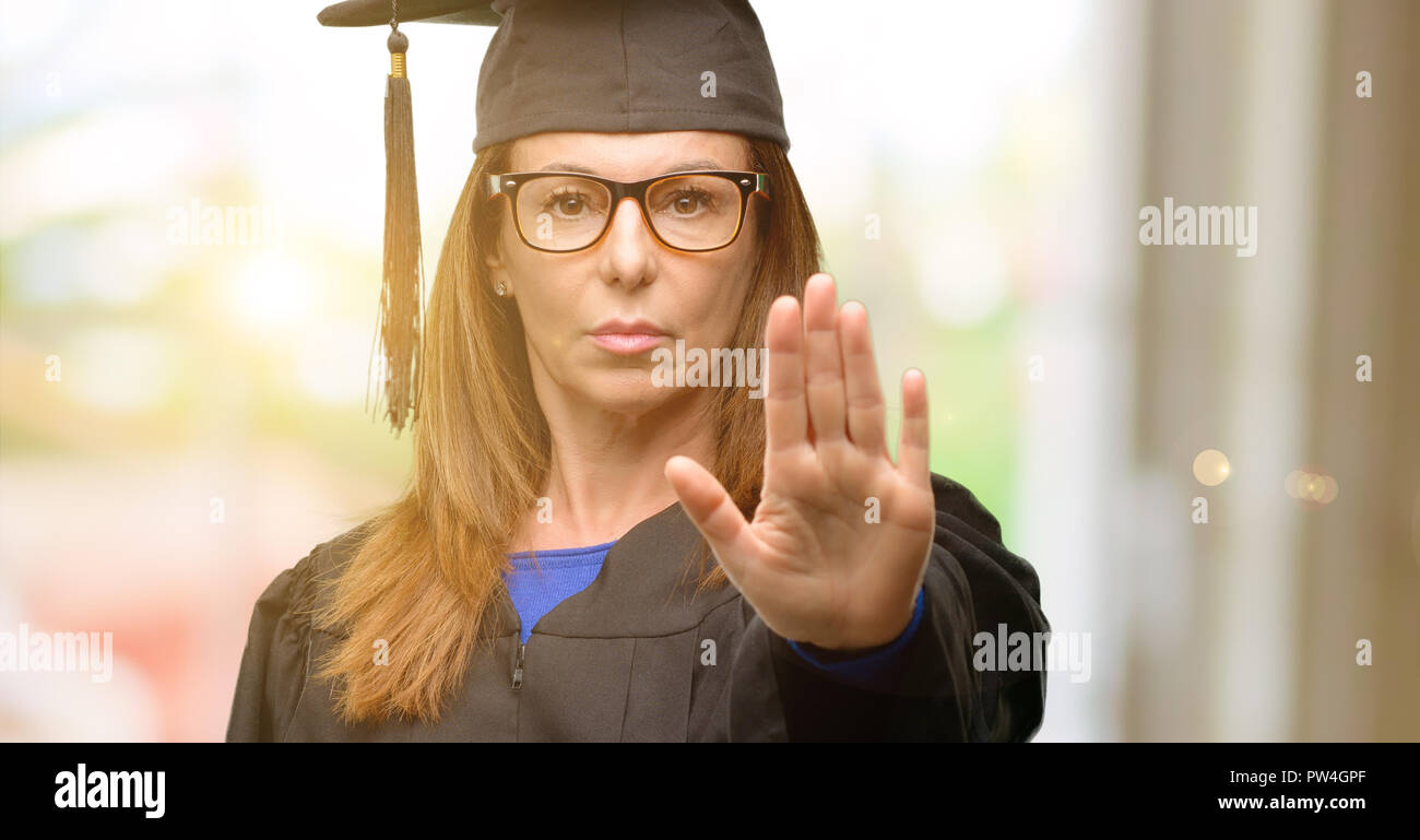 Senior graduate student woman annoyed with bad attitude making stop ...