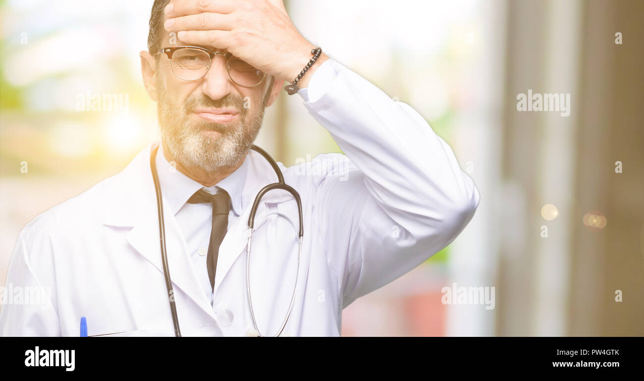 Doctor senior man, medical professional terrified and nervous ...