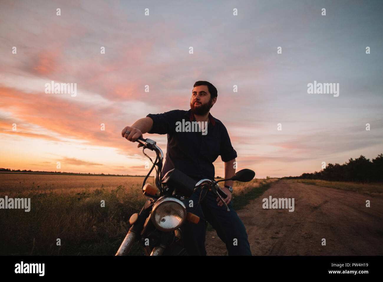 Young man on farm hi-res stock photography and images - Alamy