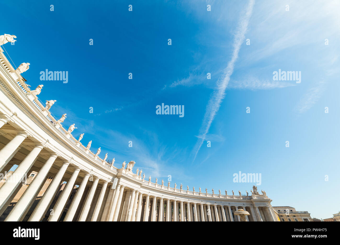 Saint Peter's square colonnade under a shining sun. Vatican City Stock ...