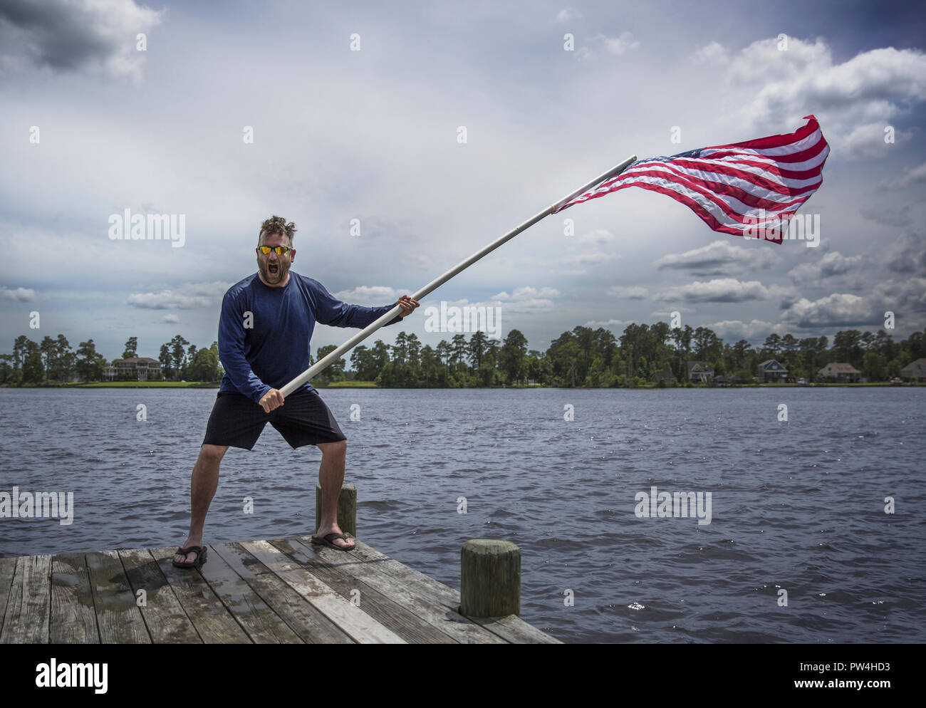 Man waving flag hi-res stock photography and images - Alamy