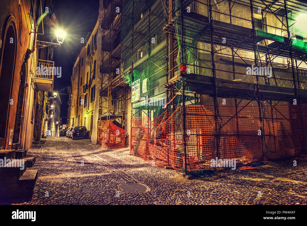 Scaffolding in an old facade in Alghero at night. Sardinia, Italy Stock ...