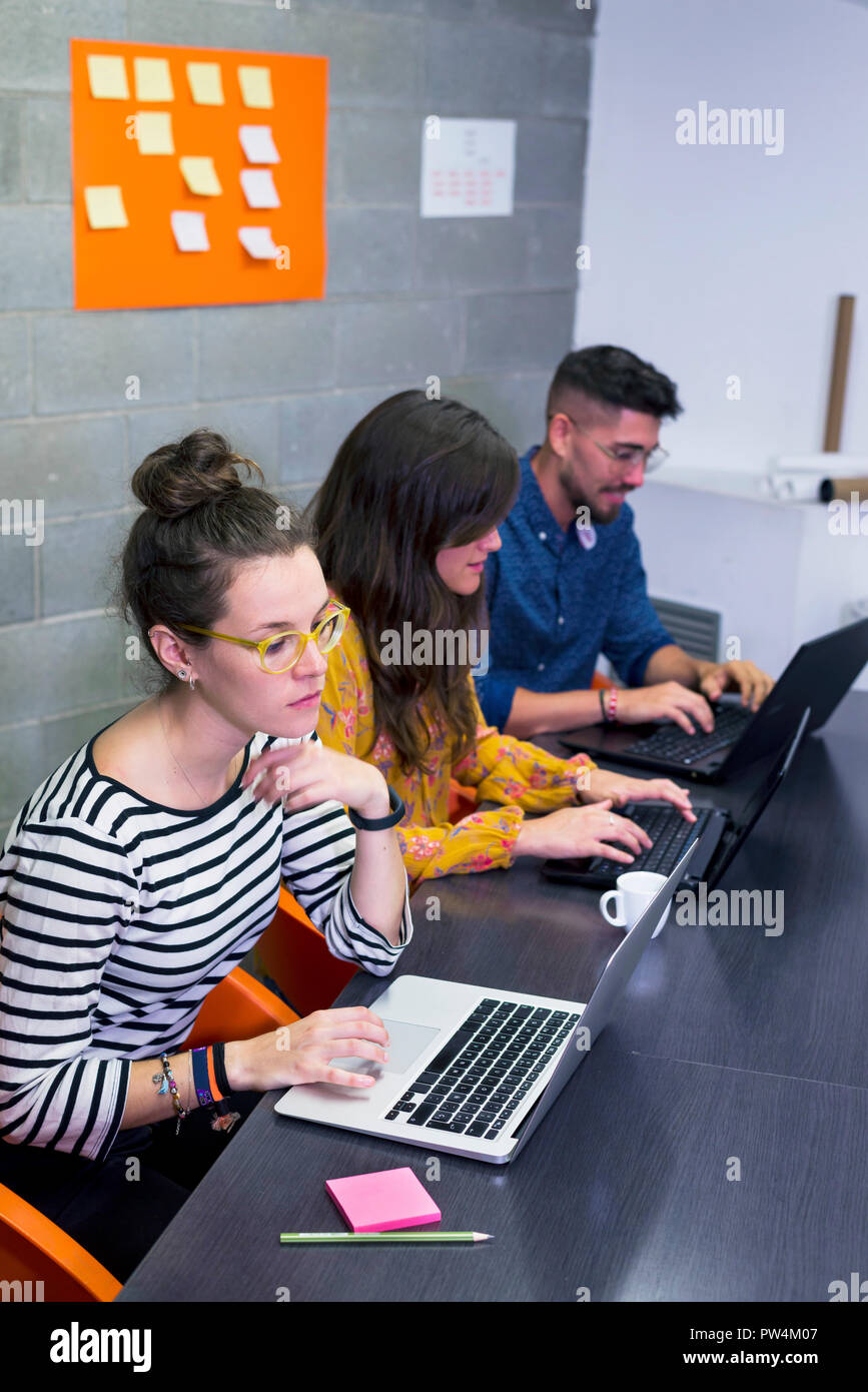 Group people laptop front view hi-res stock photography and images - Alamy