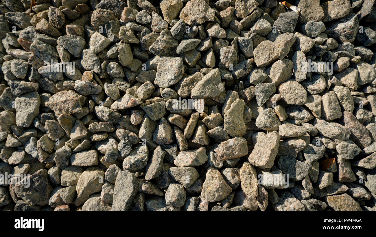 Crushed broken stone breakstone texture and background Stock Photo - Alamy