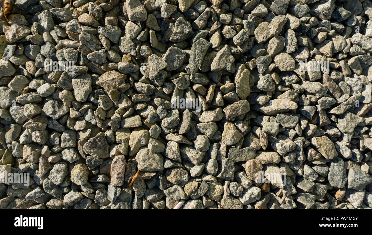 Crushed broken stone breakstone texture and background Stock Photo - Alamy