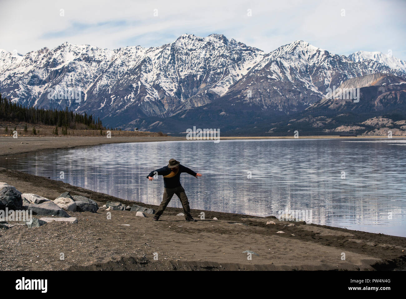 Throwing stones into water hi-res stock photography and images - Alamy