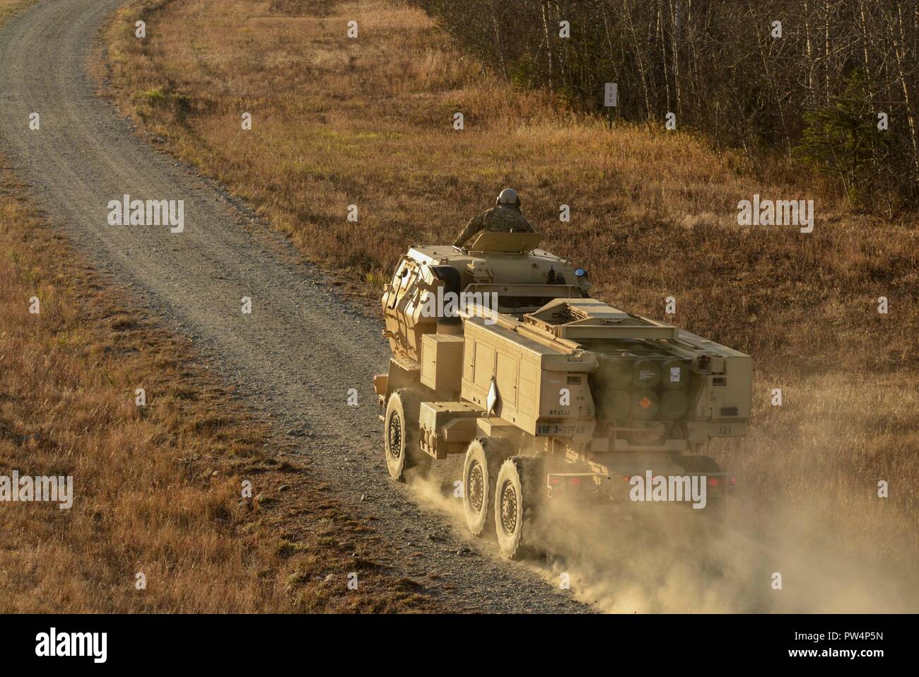 U.S. Army soldiers assigned to the 18th Field Artillery Brigade drive ...