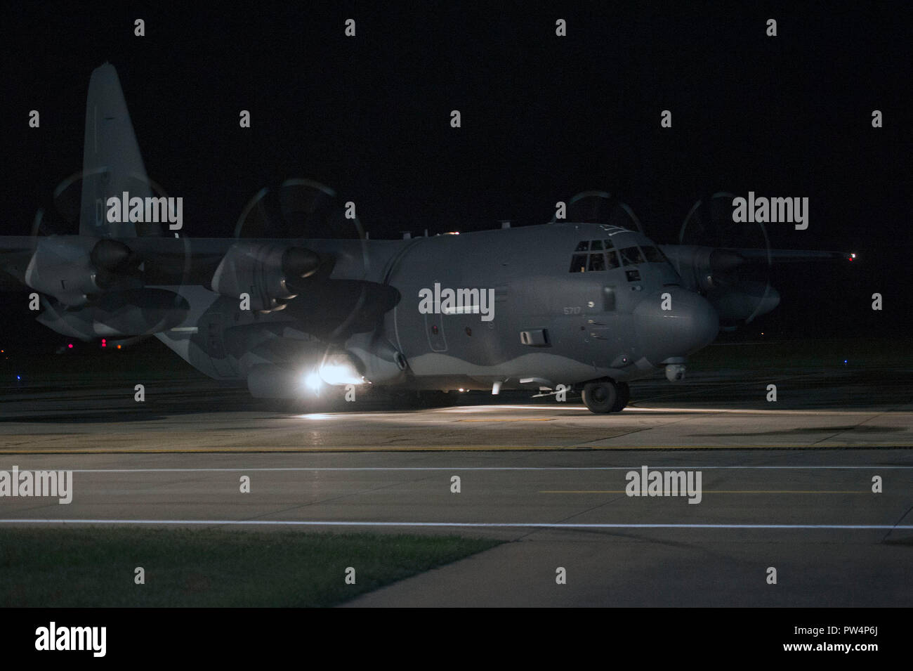 An HC-130J Combat II taxis on the runway carrying 41st Rescue Squadron ...