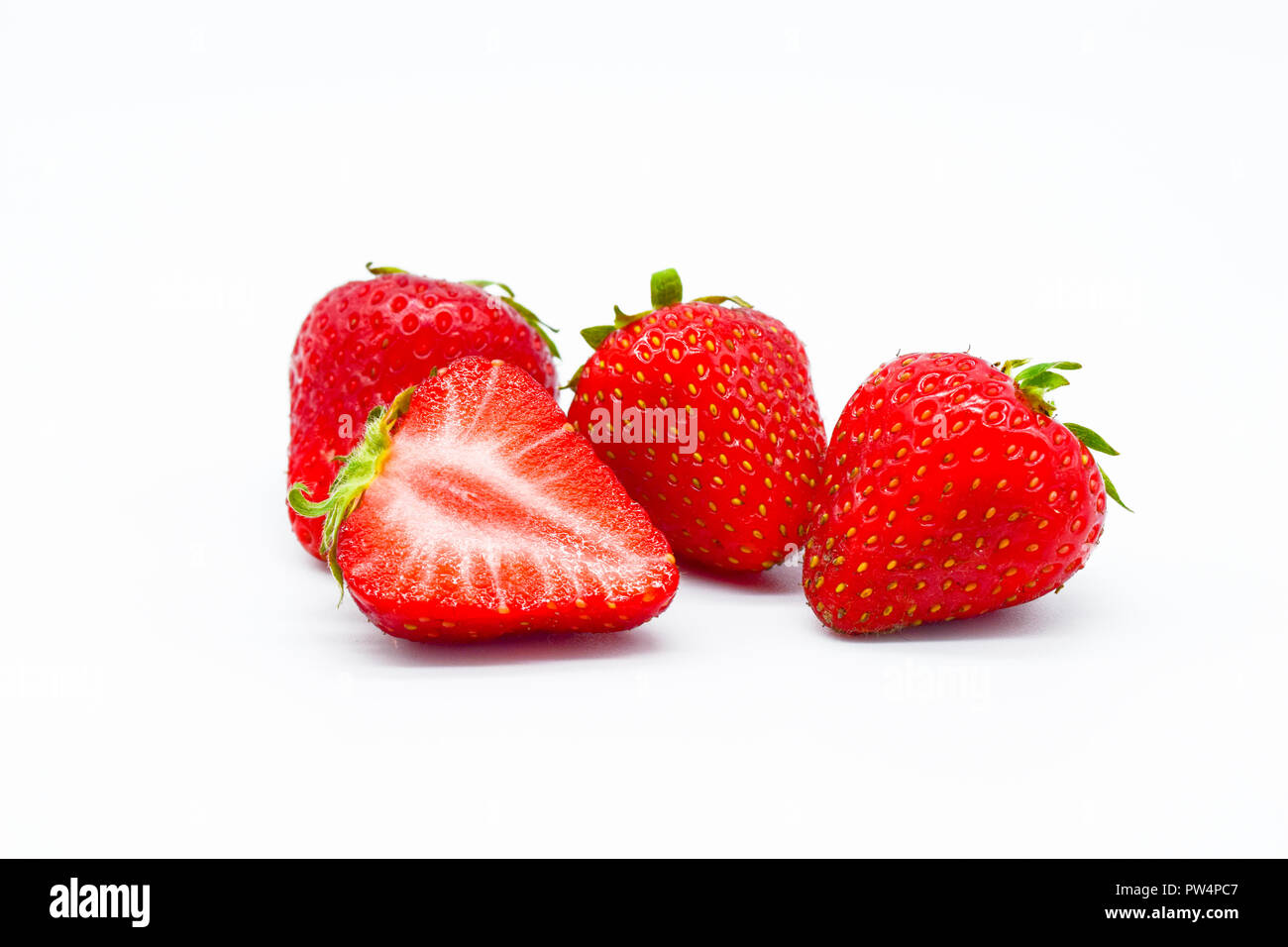 fresh strawberries fruits isolated on white background Stock Photo - Alamy