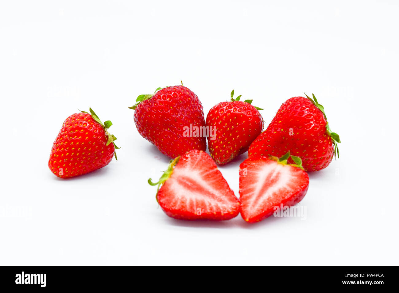 fresh strawberries fruits isolated on white background Stock Photo - Alamy