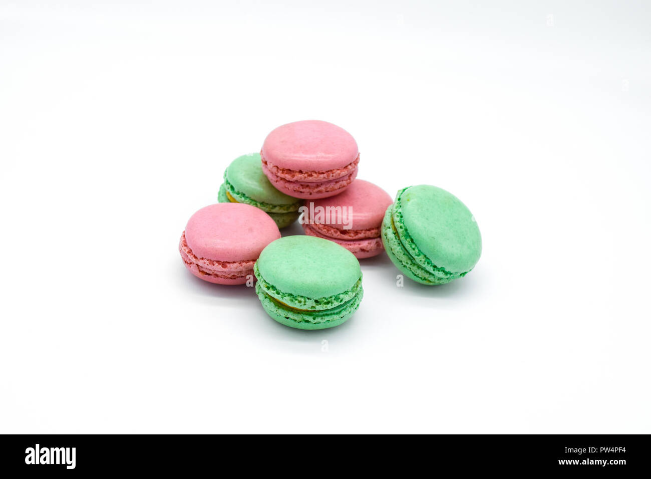 Sweet colorful macarons isolated on white background Stock Photo - Alamy