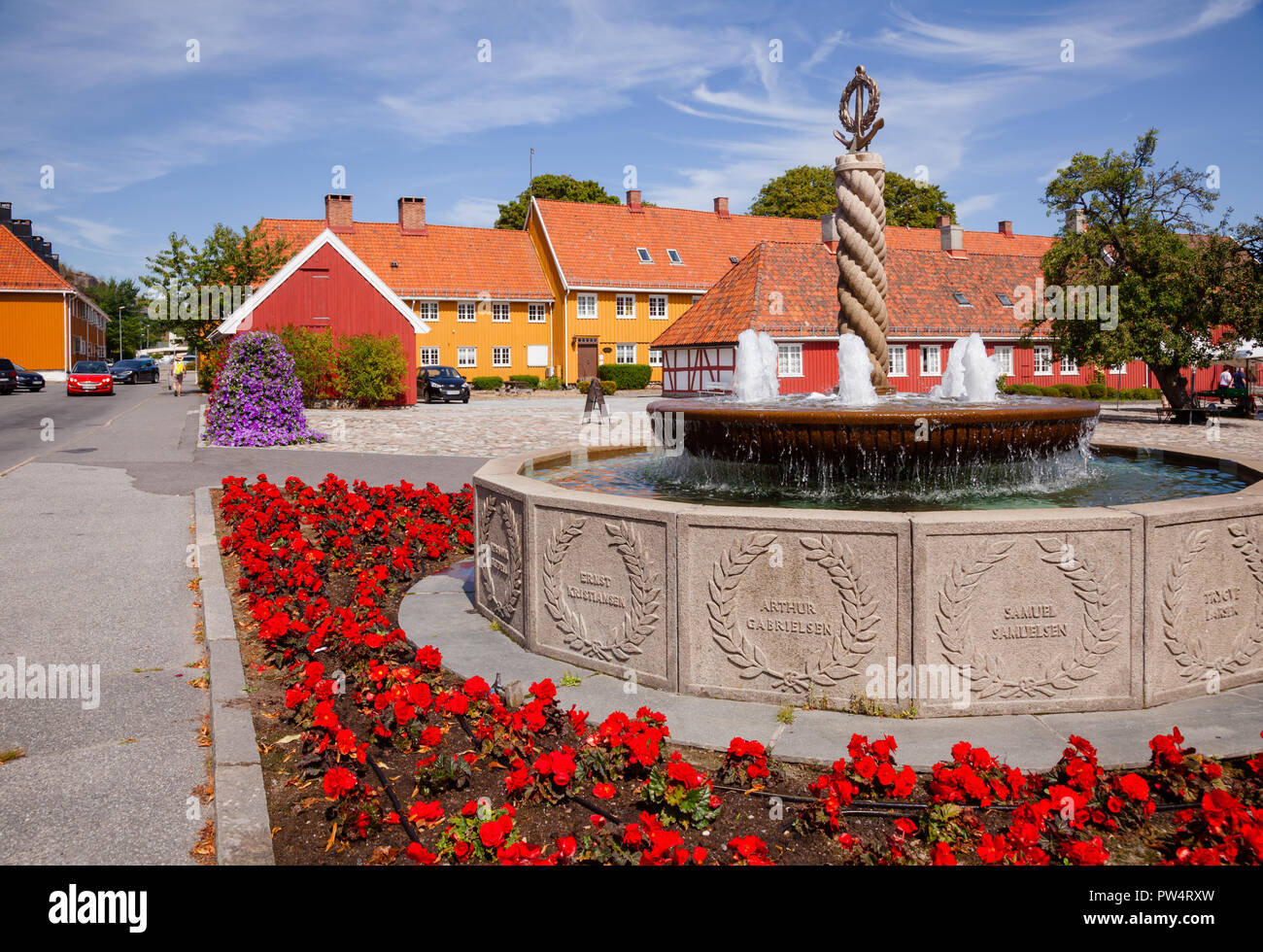 STAVERN, NORWAY - JULY 20, 2018: Historic buildings and fountain at the ...
