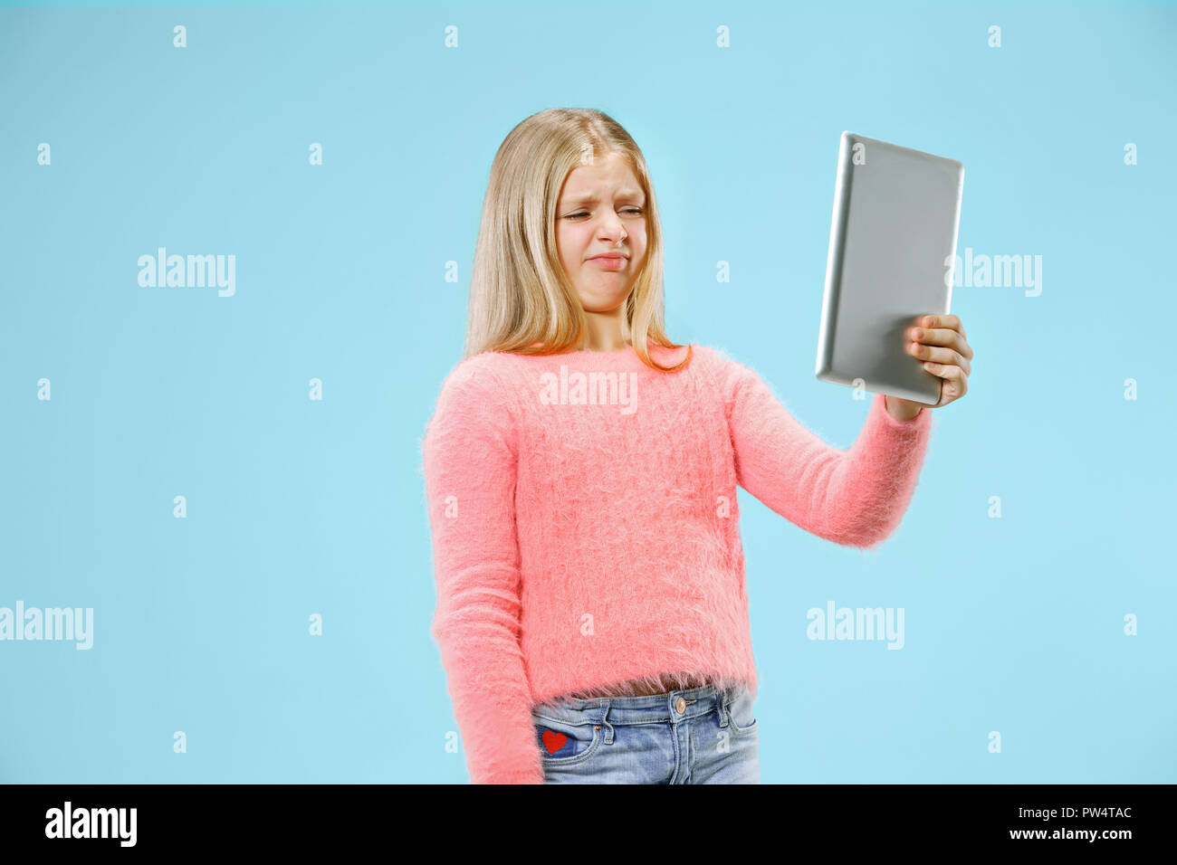 Teen girl with laptop. Love to computer concept. Attractive female half ...