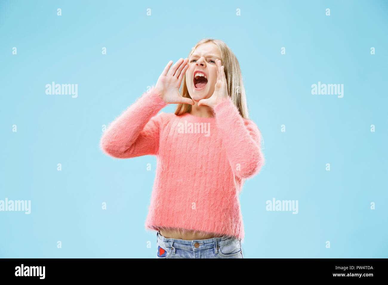 Do not miss. Young casual teen girl shouting. Shout. Crying emotional ...