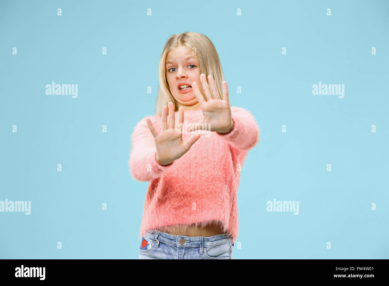 Reject, rejection, doubt concept. Young emotional teen girl at studio ...