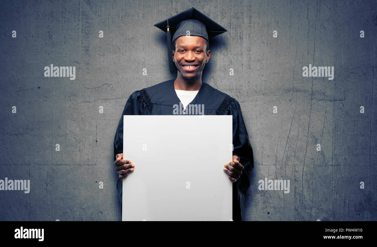 Young african graduate student black man holding blank advertising ...