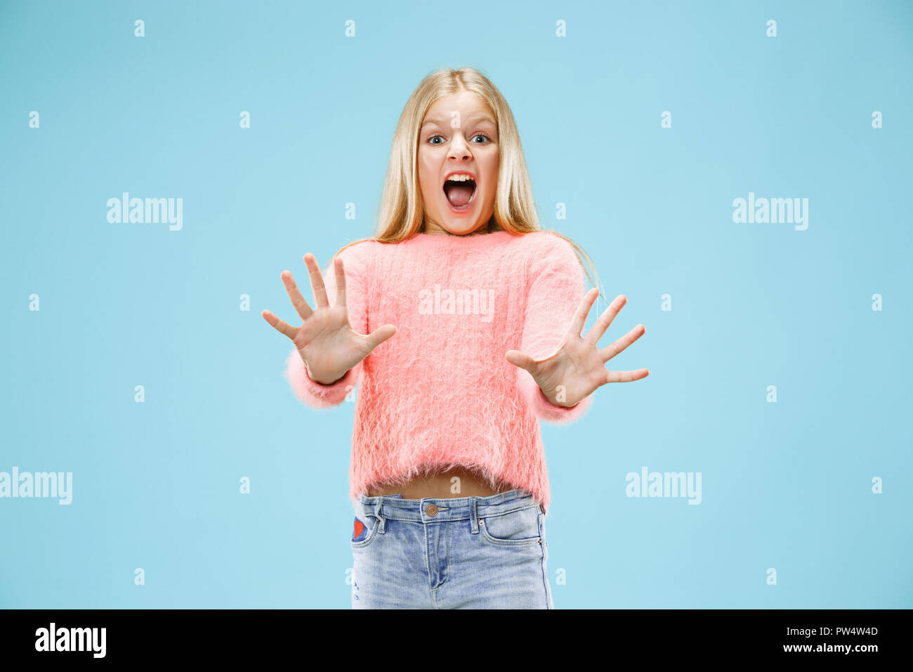 I'm afraid. Fright. Portrait of the scared teen girl. She standing ...