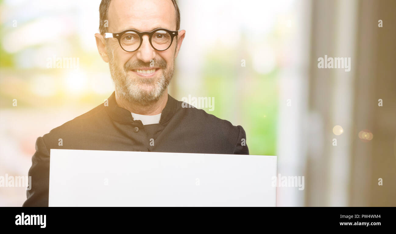 Priest religion man holding blank advertising banner, good poster for ...