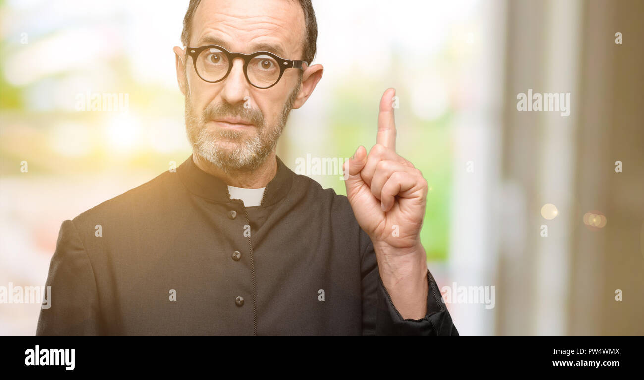 Priest surprised hi-res stock photography and images - Alamy
