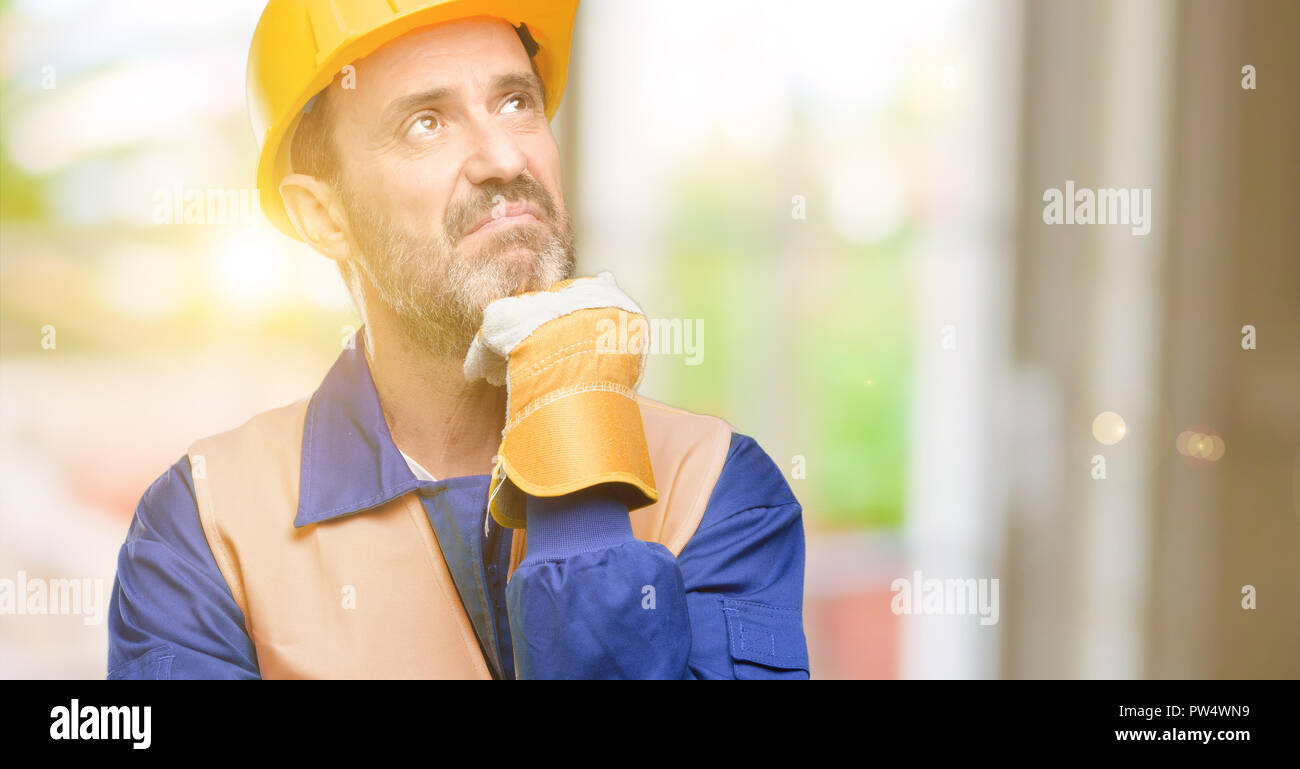 Construction worker thinking hi-res stock photography and images - Alamy
