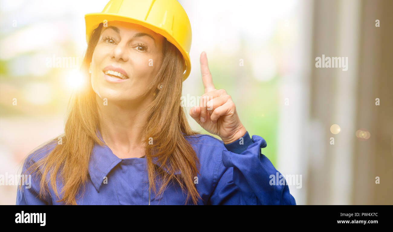 Engineer construction worker woman happy and surprised cheering ...