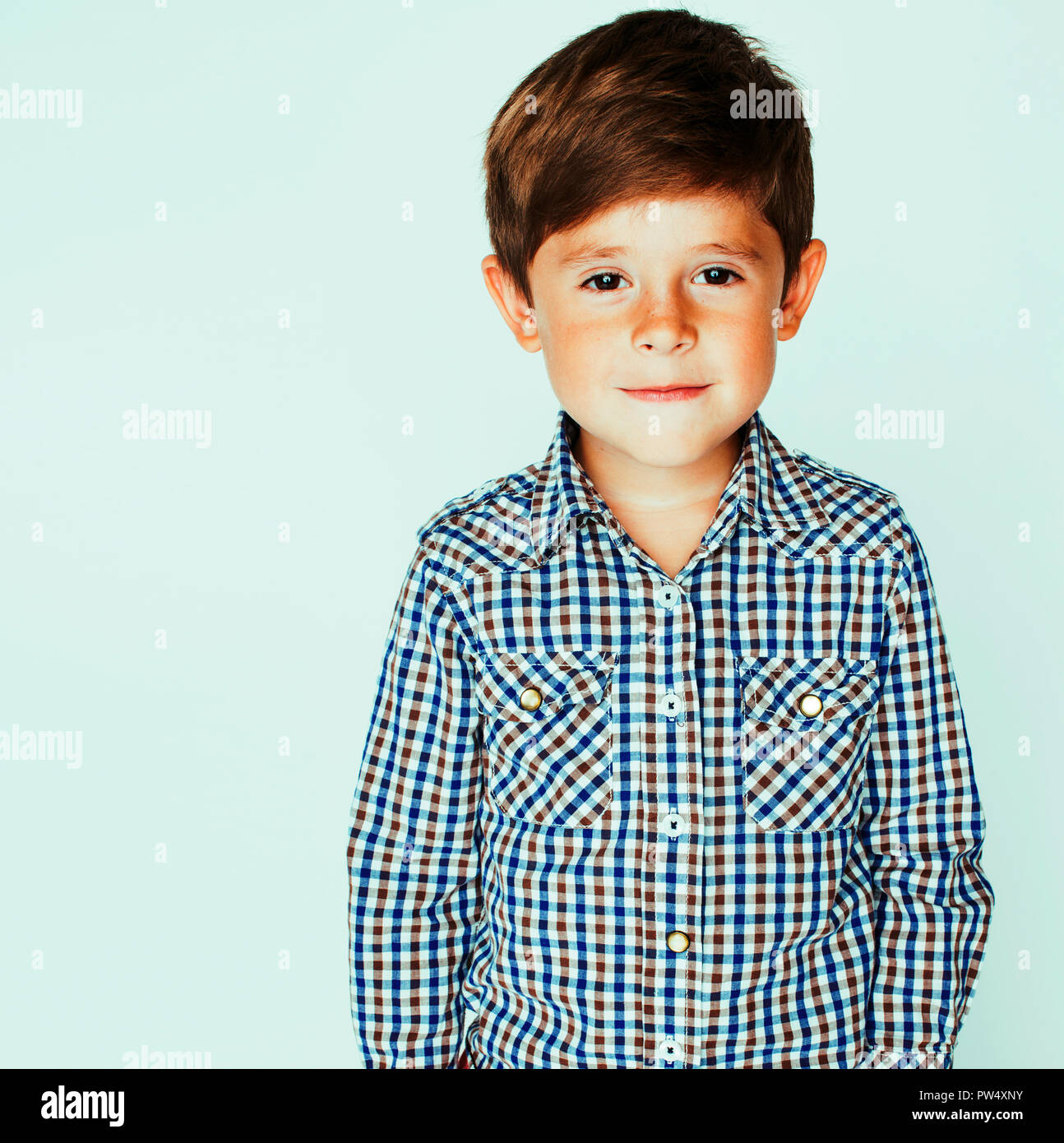 young pretty little cute boy kid wondering, posing emotional fac Stock ...