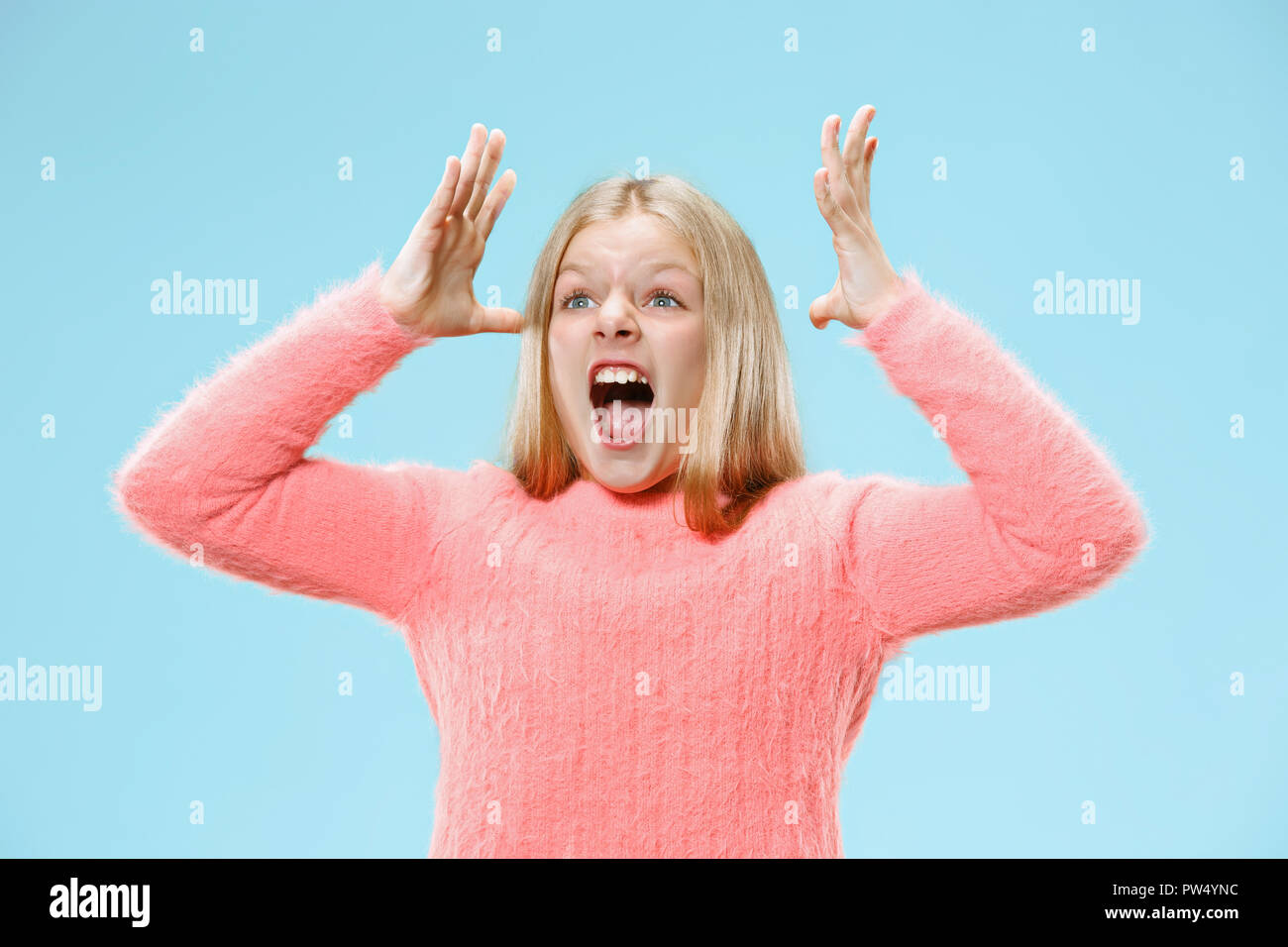 Do not miss. Young casual teen girl shouting. Shout. Crying emotional ...