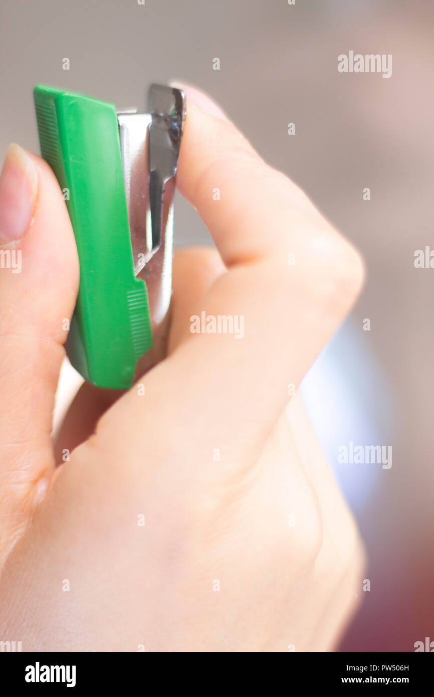 Staple gun woman hi-res stock photography and images - Alamy