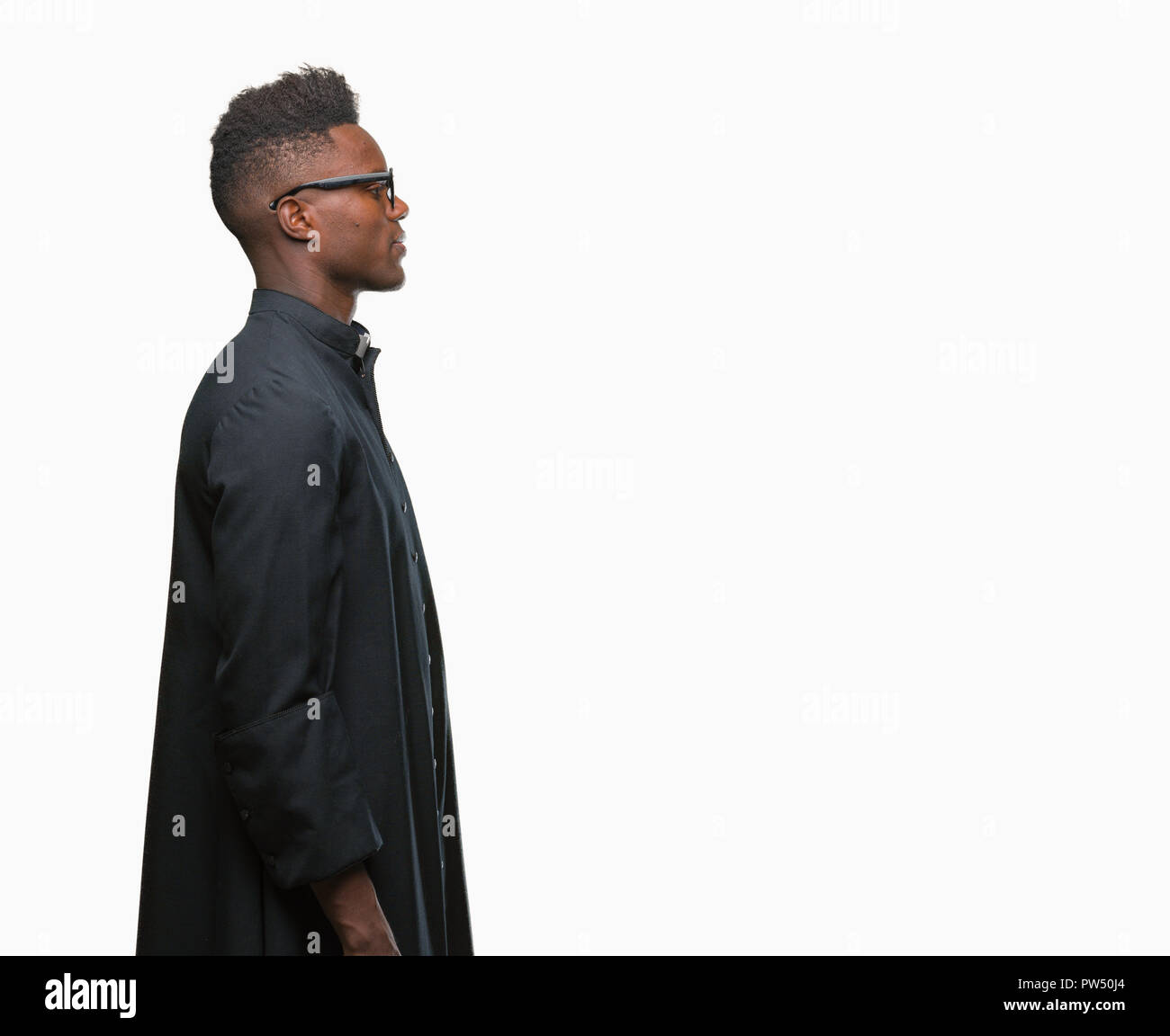 Young african american priest man over isolated background looking to ...