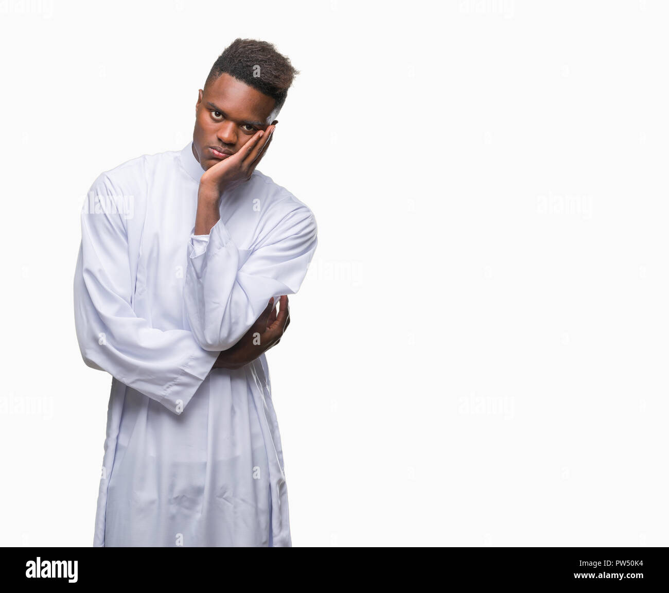 Young arabic african man wearing traditional djellaba over isolated ...
