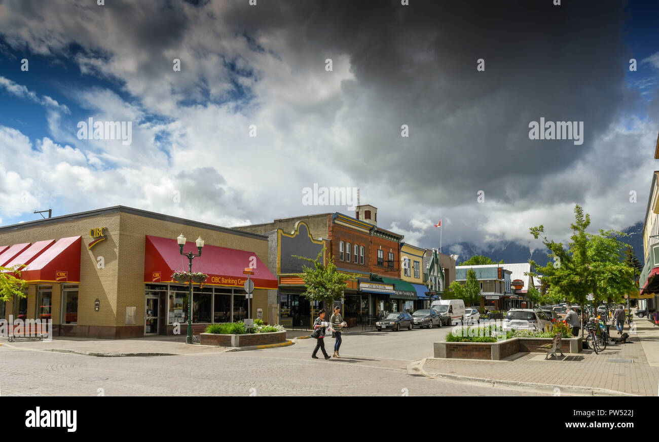 REVELSTOKE, BRITISH COLUMBIA, CANADA - JUNE 2018: Shops on a tree-lined ...