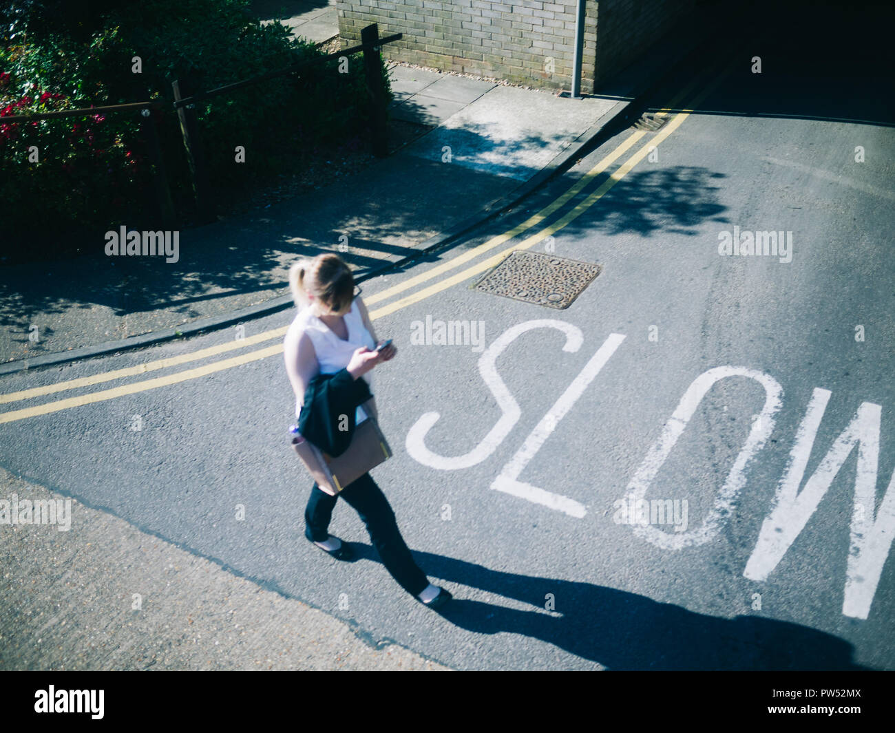 Lady reading a sign hi-res stock photography and images - Alamy